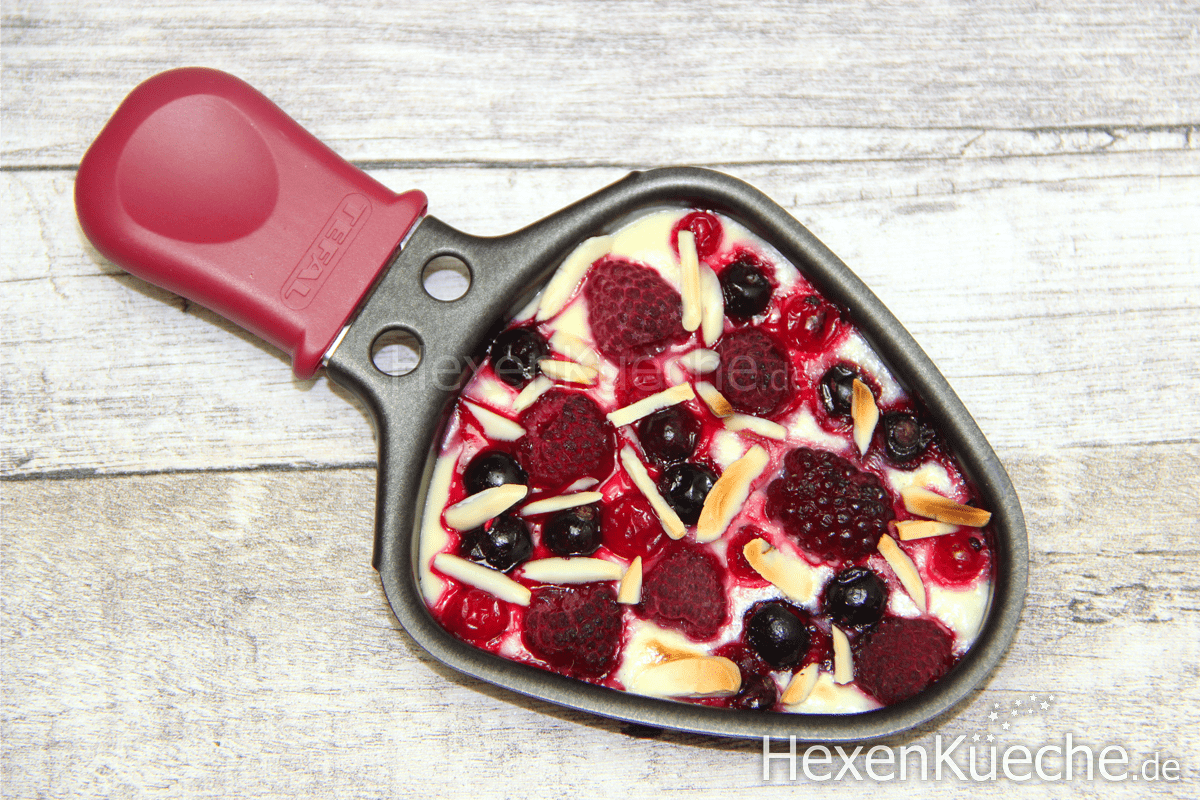 Raclette Pfännchen – Cheesecake mit Himbeeren und Mandelsplittern ...